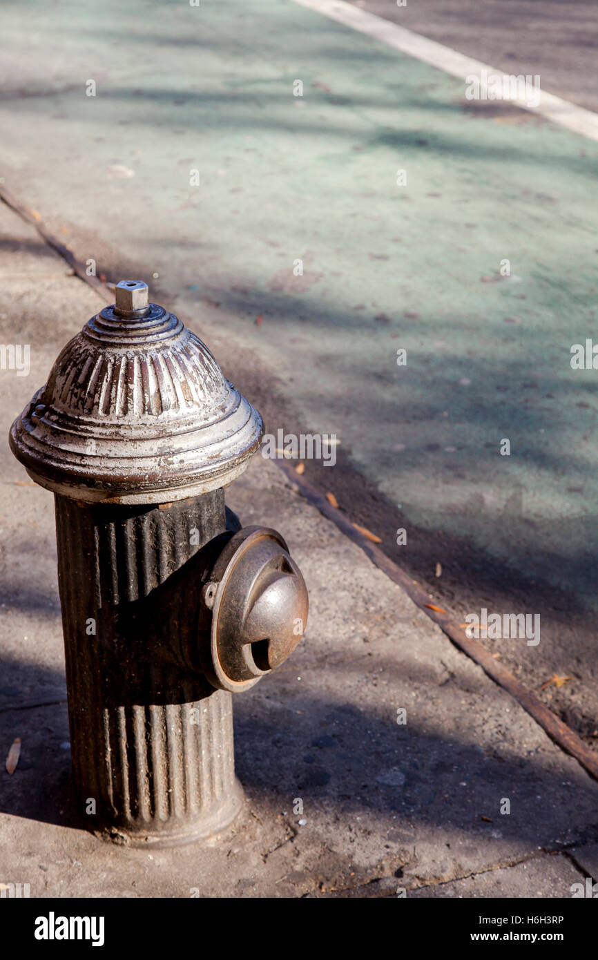 Fire hydrant on pavement Stock Photo - Alamy