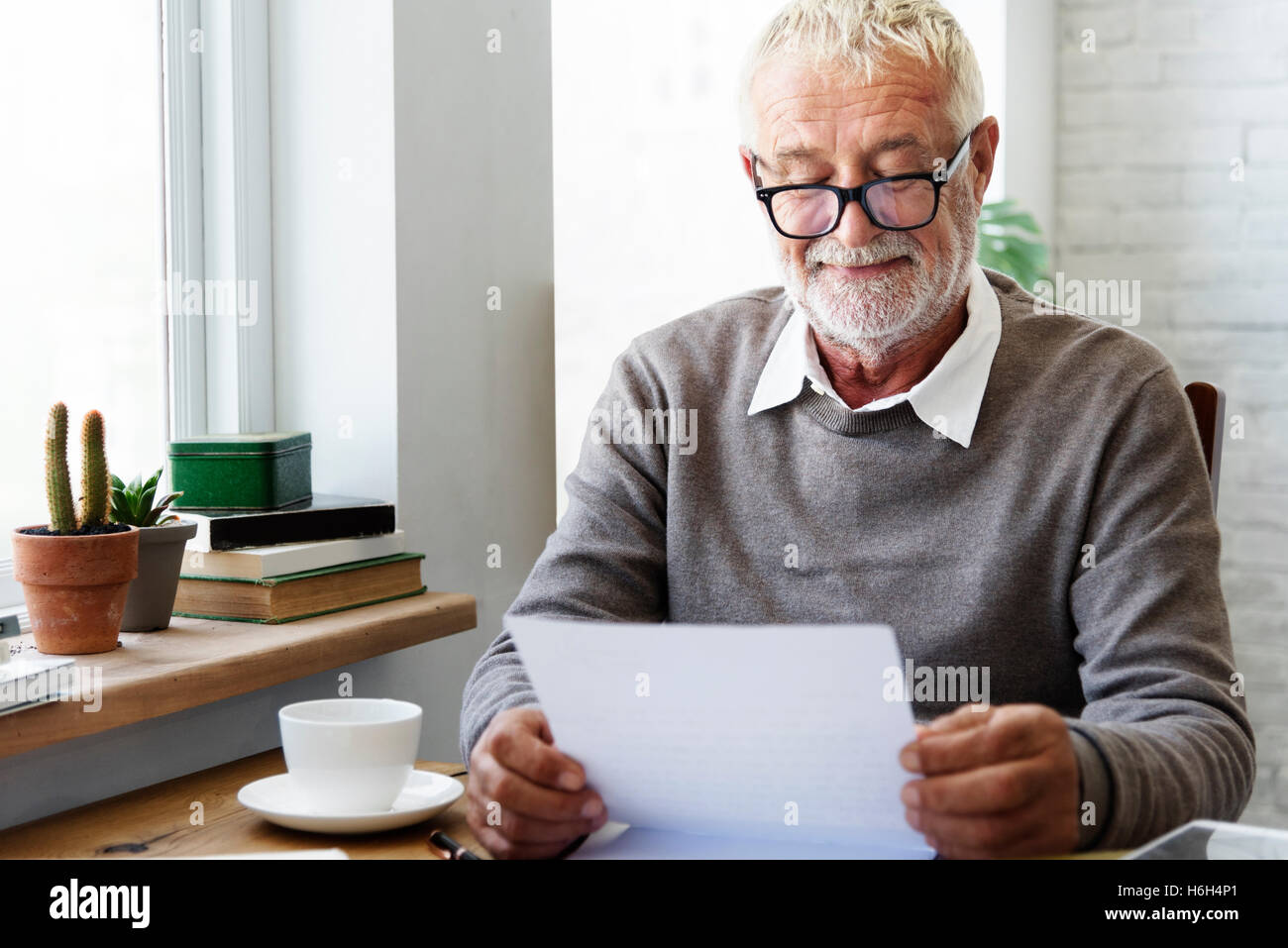 Senior Adult Reading Letter Postcard Concept Stock Photo - Alamy
