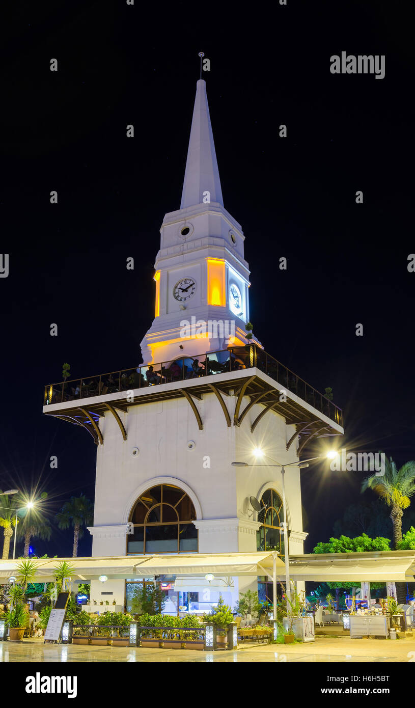 Night view of central clock tower in Kemer, Turkey. Kemer a seaside ...