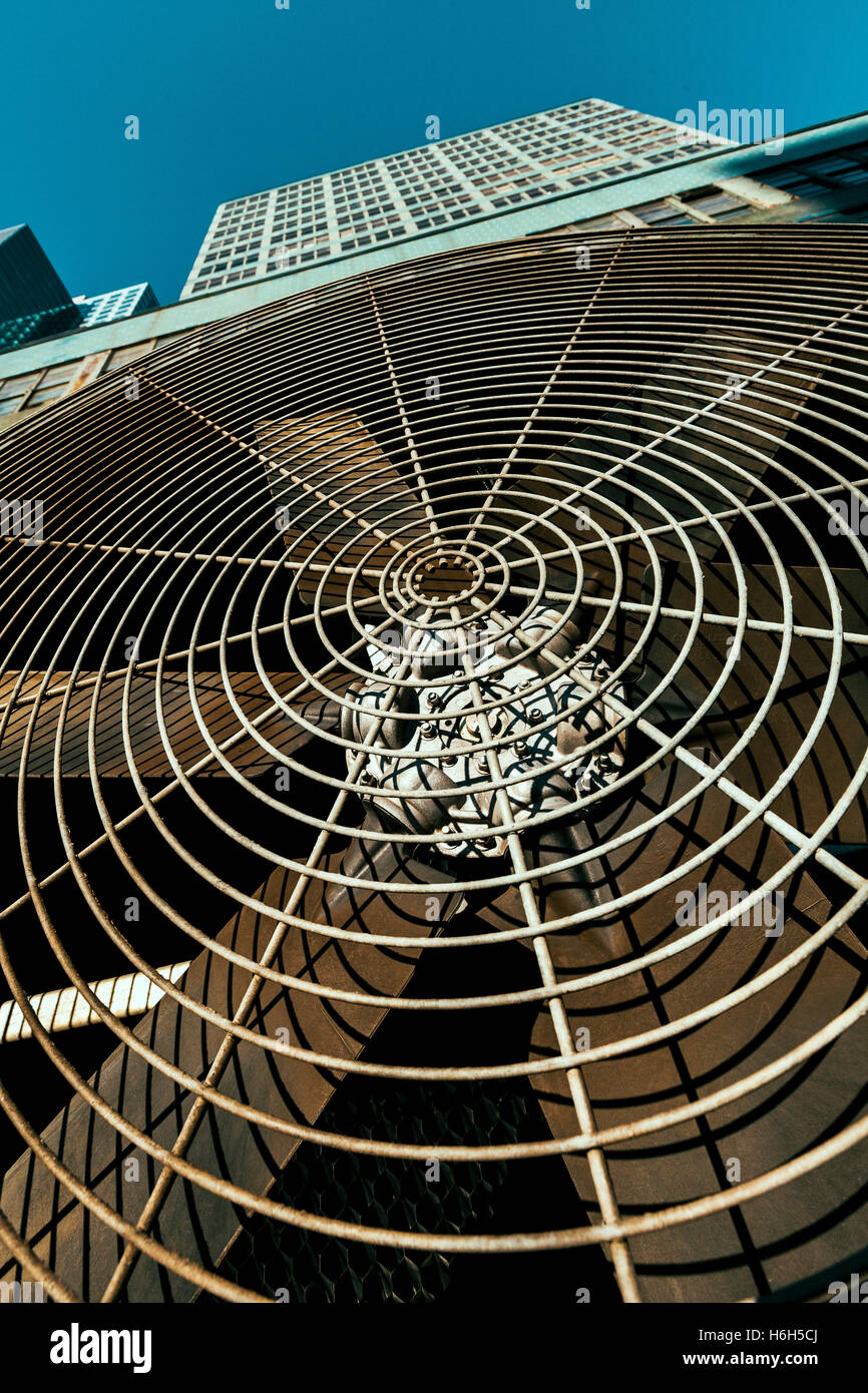 Wide angle view of an outdoor HVAC air conditioner unit located on a ...