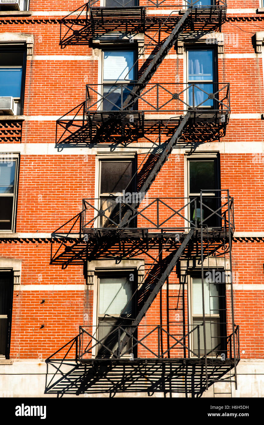 The exterior of a red stone residential building in Manhattan Stock ...