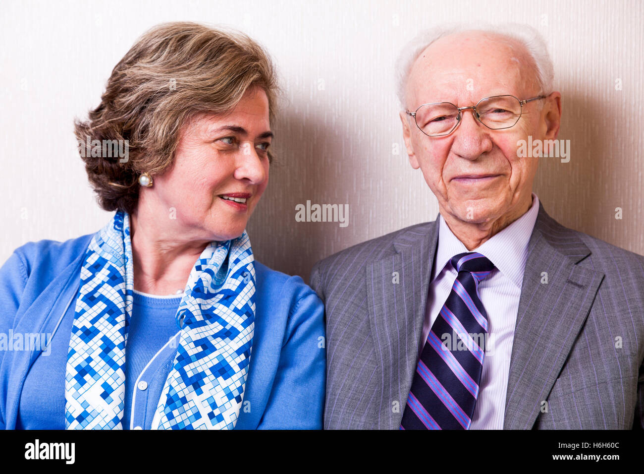 A high society senior couple (he's in his 80's, she's in her late 60's ...
