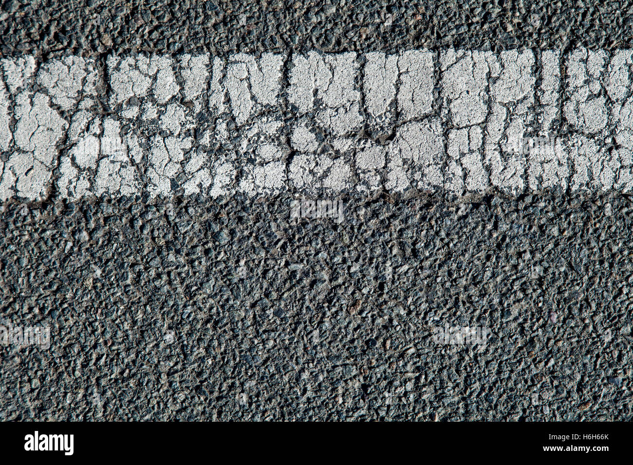 Detail view of asphalt road with white line markings on it Stock Photo ...