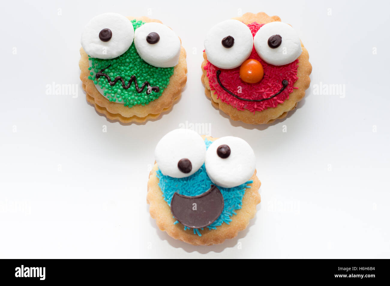 three colourful cookies Stock Photo - Alamy