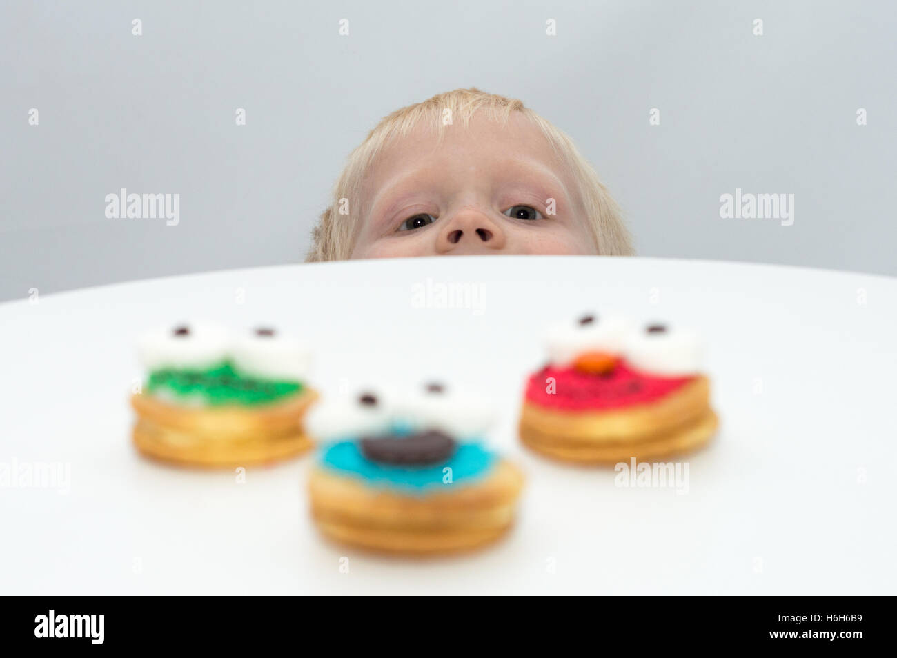 little child with cookies Stock Photo - Alamy