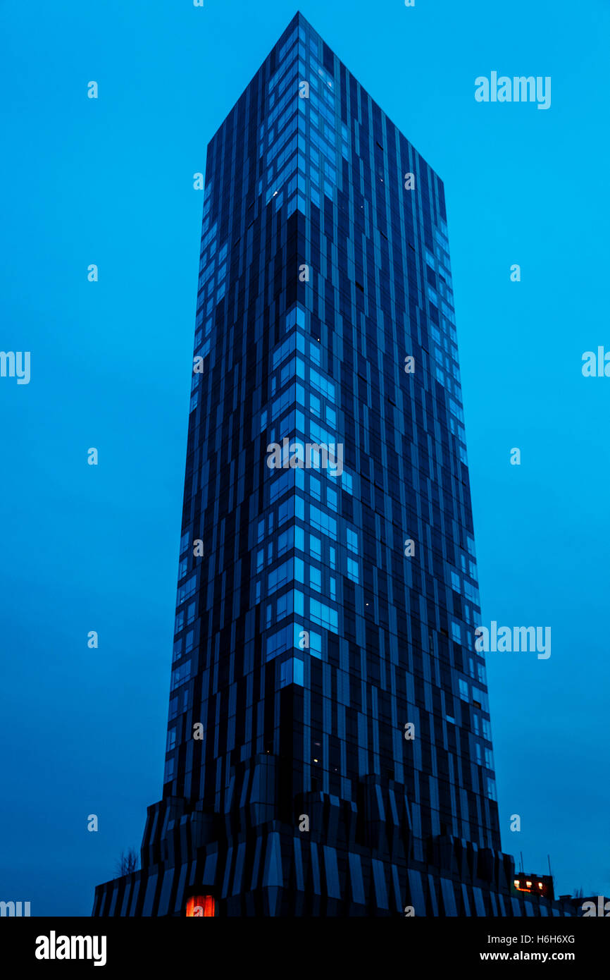 Office building under the deep blue dusk sky Stock Photo - Alamy