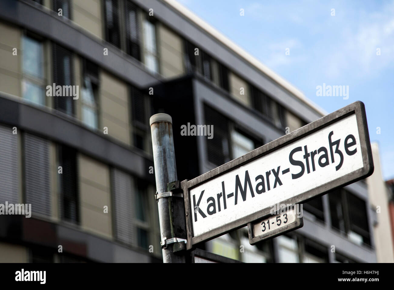 Street signs in an intersection says it is Larl-Marx Strasse and ...