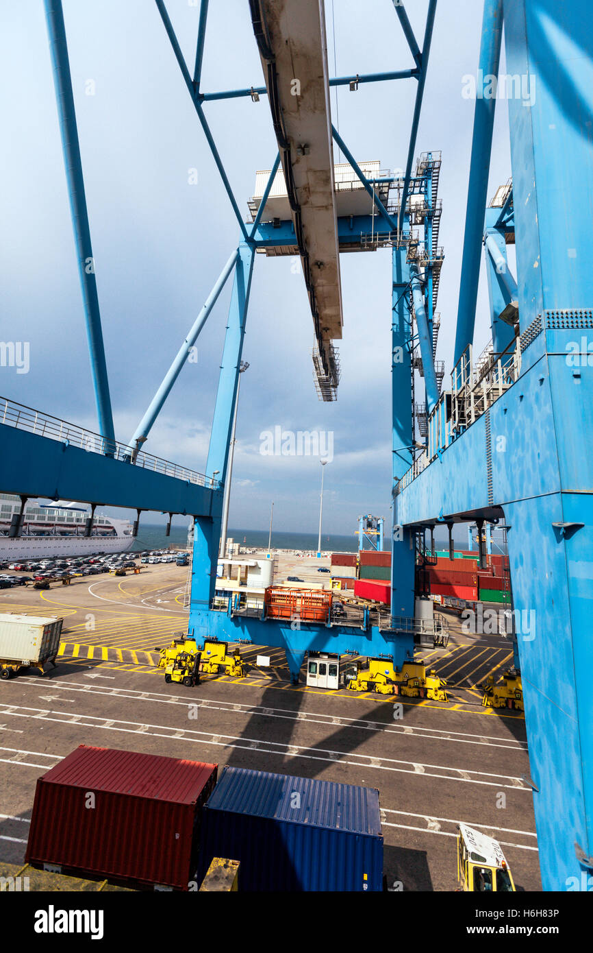 Commercial harbor dock and massive container crane as seen from a ...