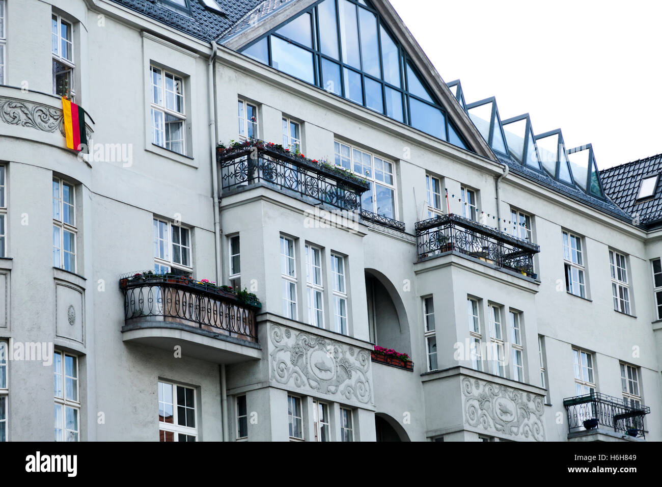 Building in Berlin with the German flag handing from a porch Stock ...