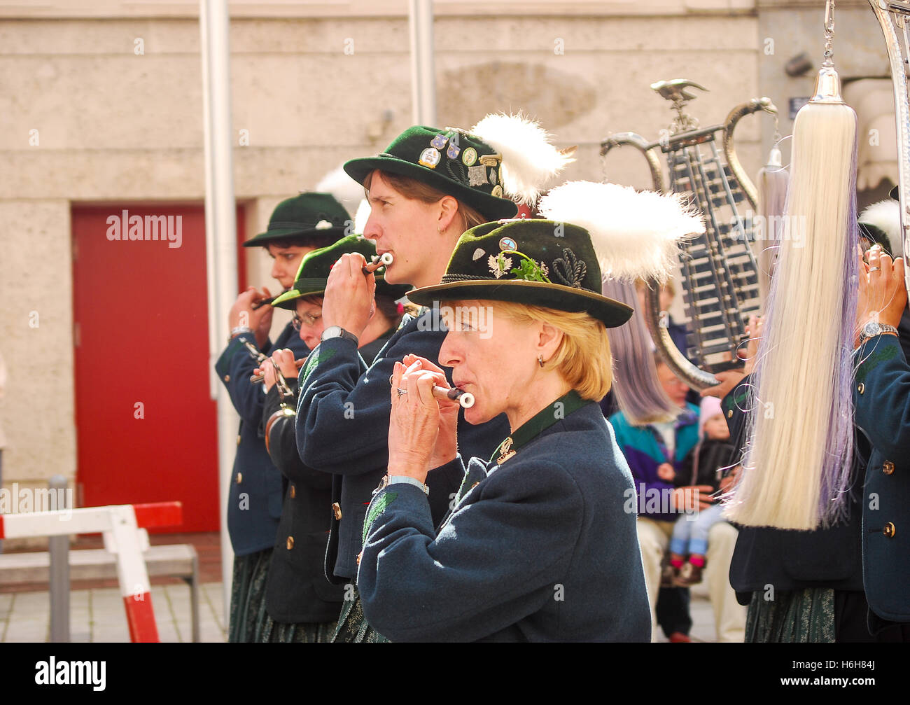 Members of bavarian marching band play flute during concert Stock Photo ...