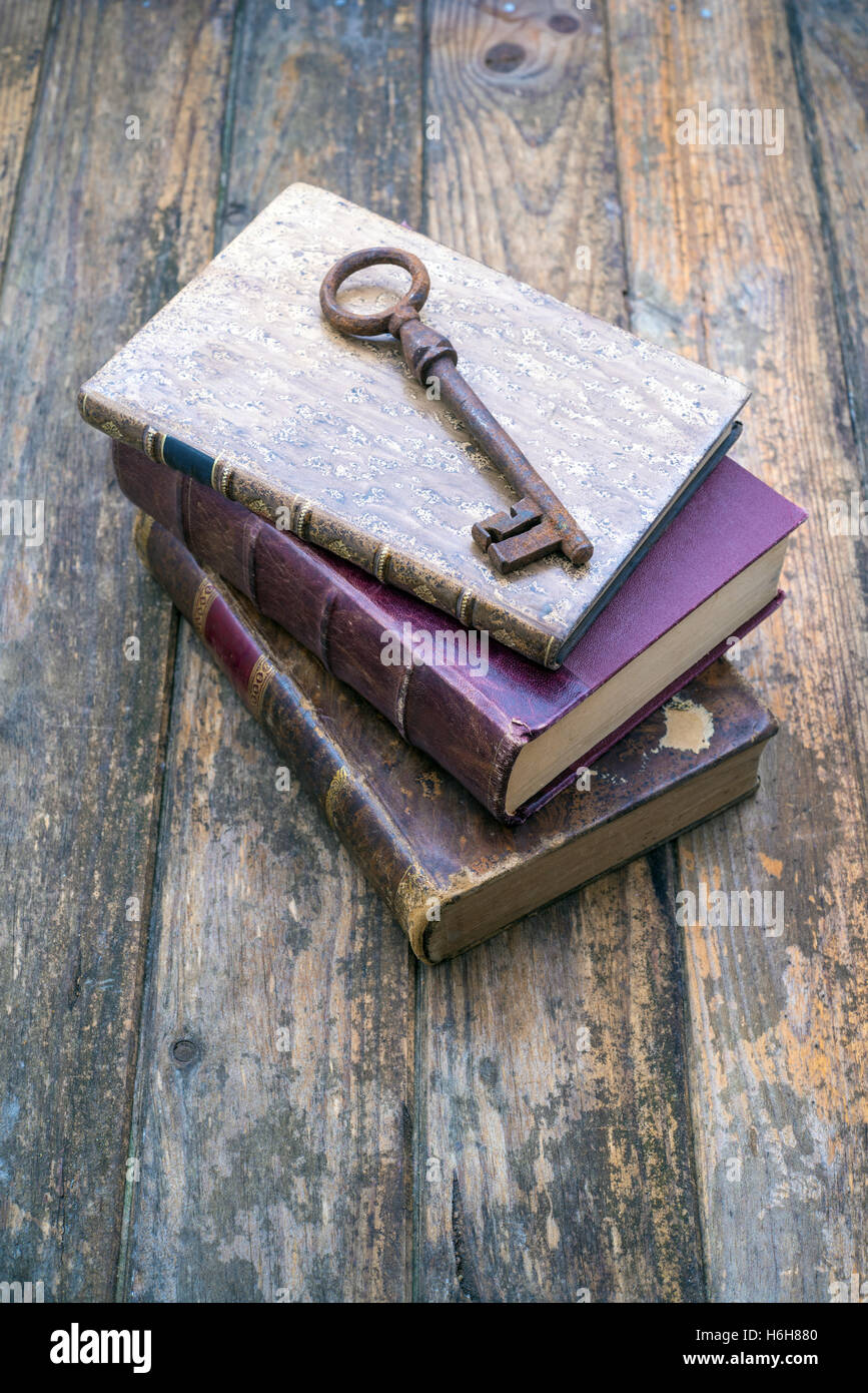 old keys on a old book, antique wood background Stock Photo - Alamy