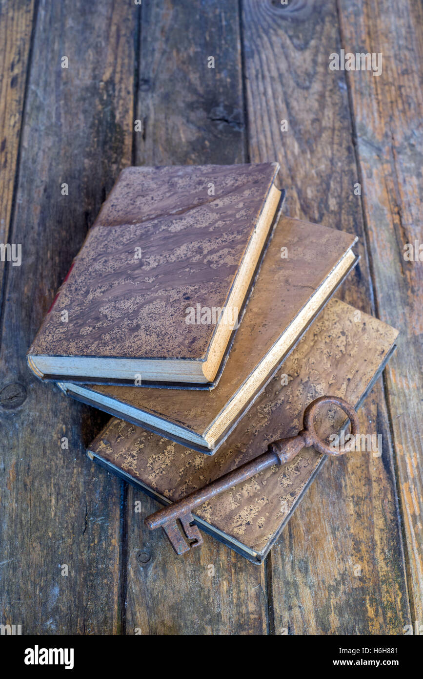 old keys on a old book, antique wood background Stock Photo - Alamy