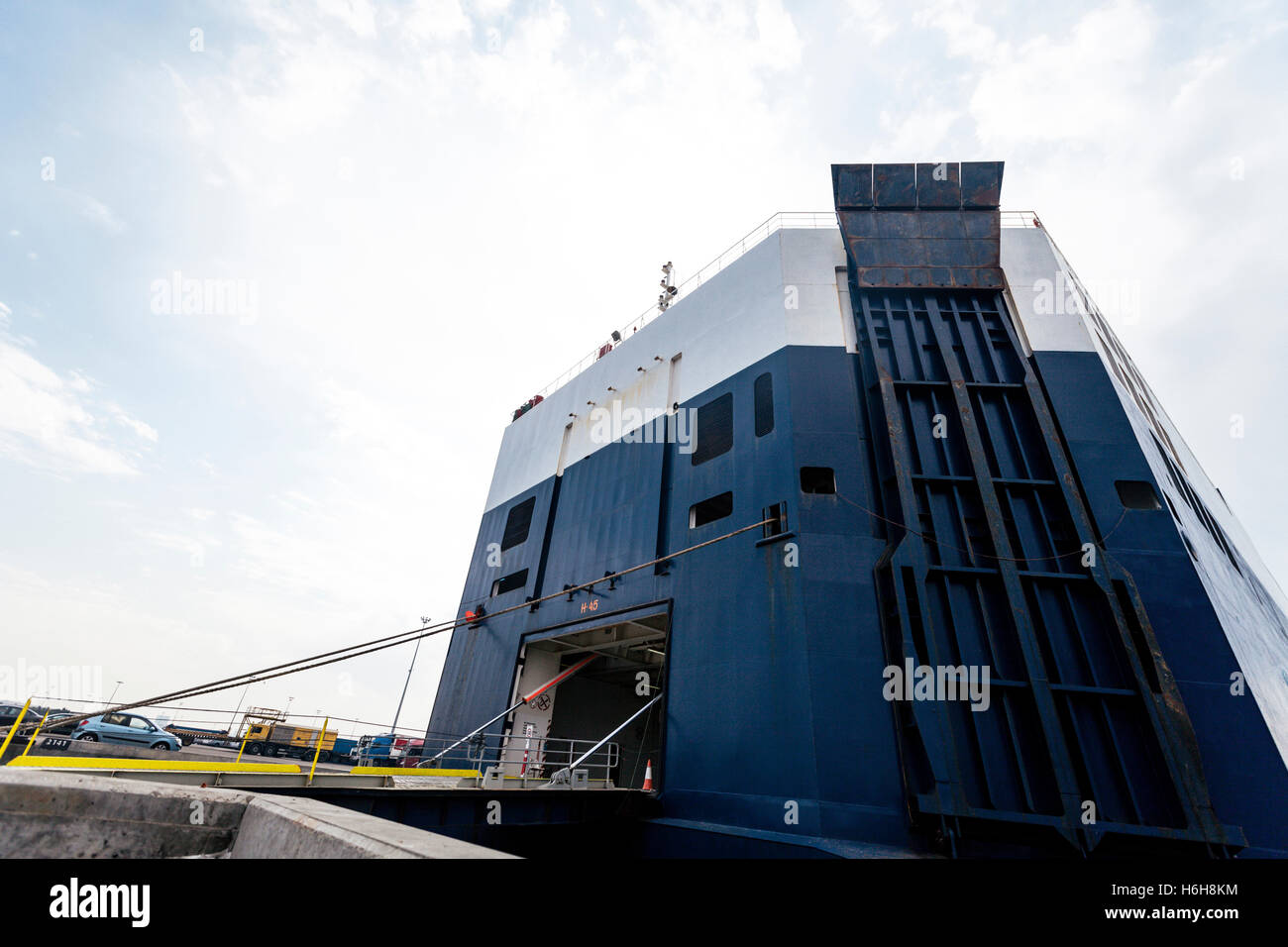 View of a car freighter docking in a commercial port, in the process of ...