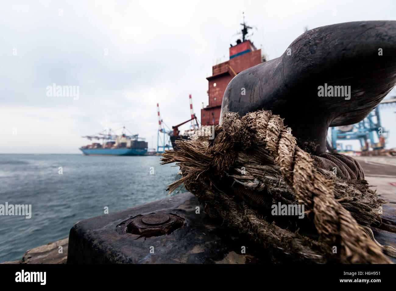 Docking freighter ships in a commercial harbor Stock Photo - Alamy