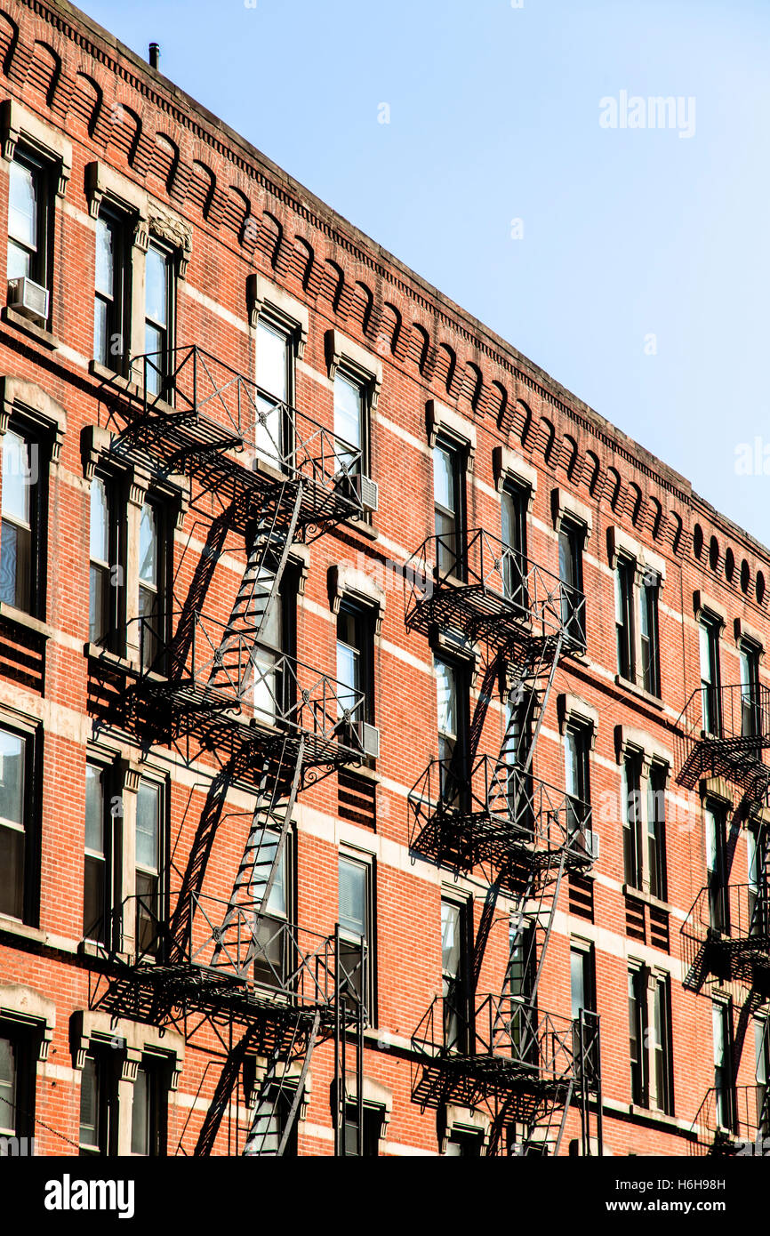 The exterior of a red stone residential building in Manhattan Stock ...