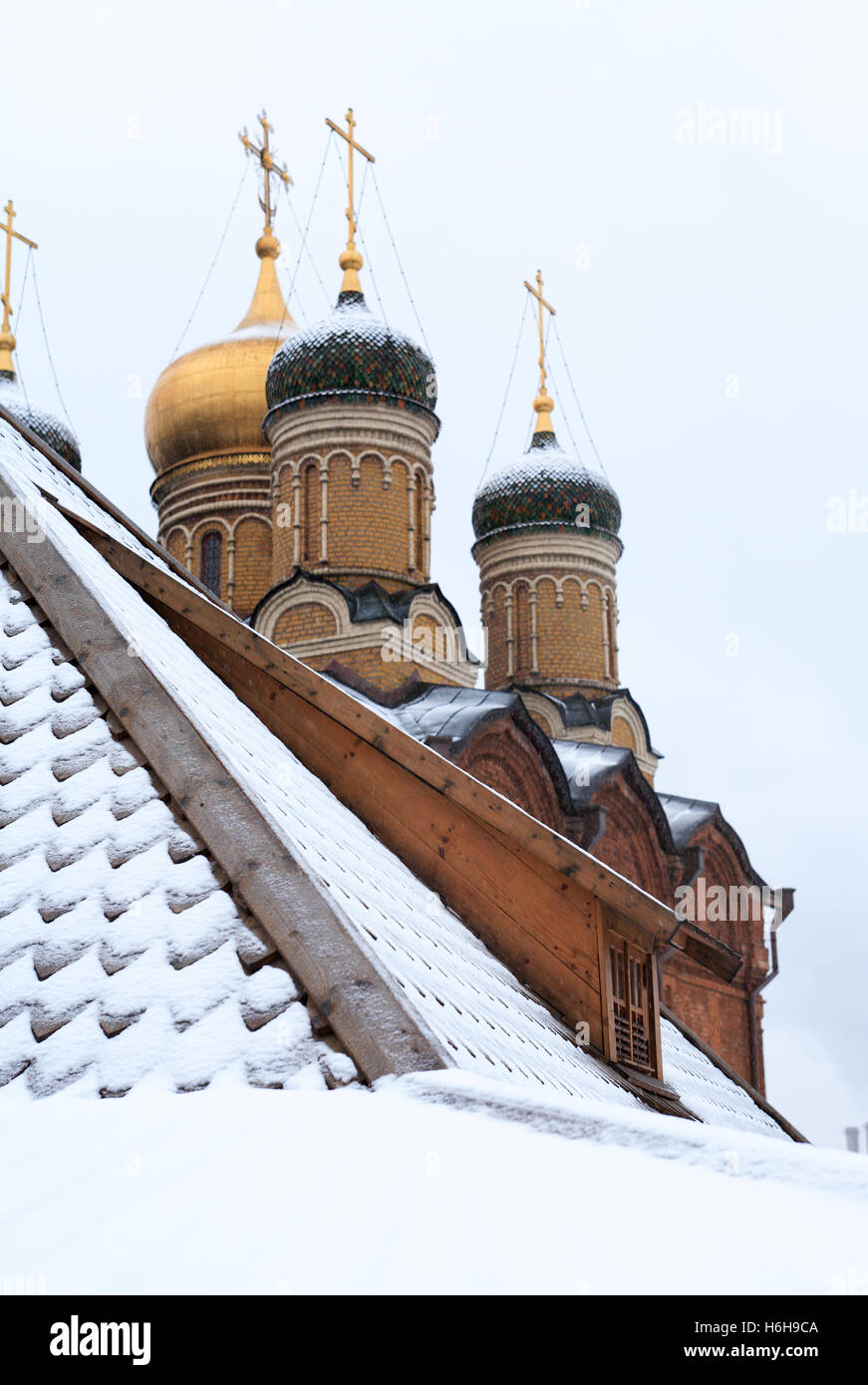 Roof under snow against old church in Russia Stock Photo - Alamy