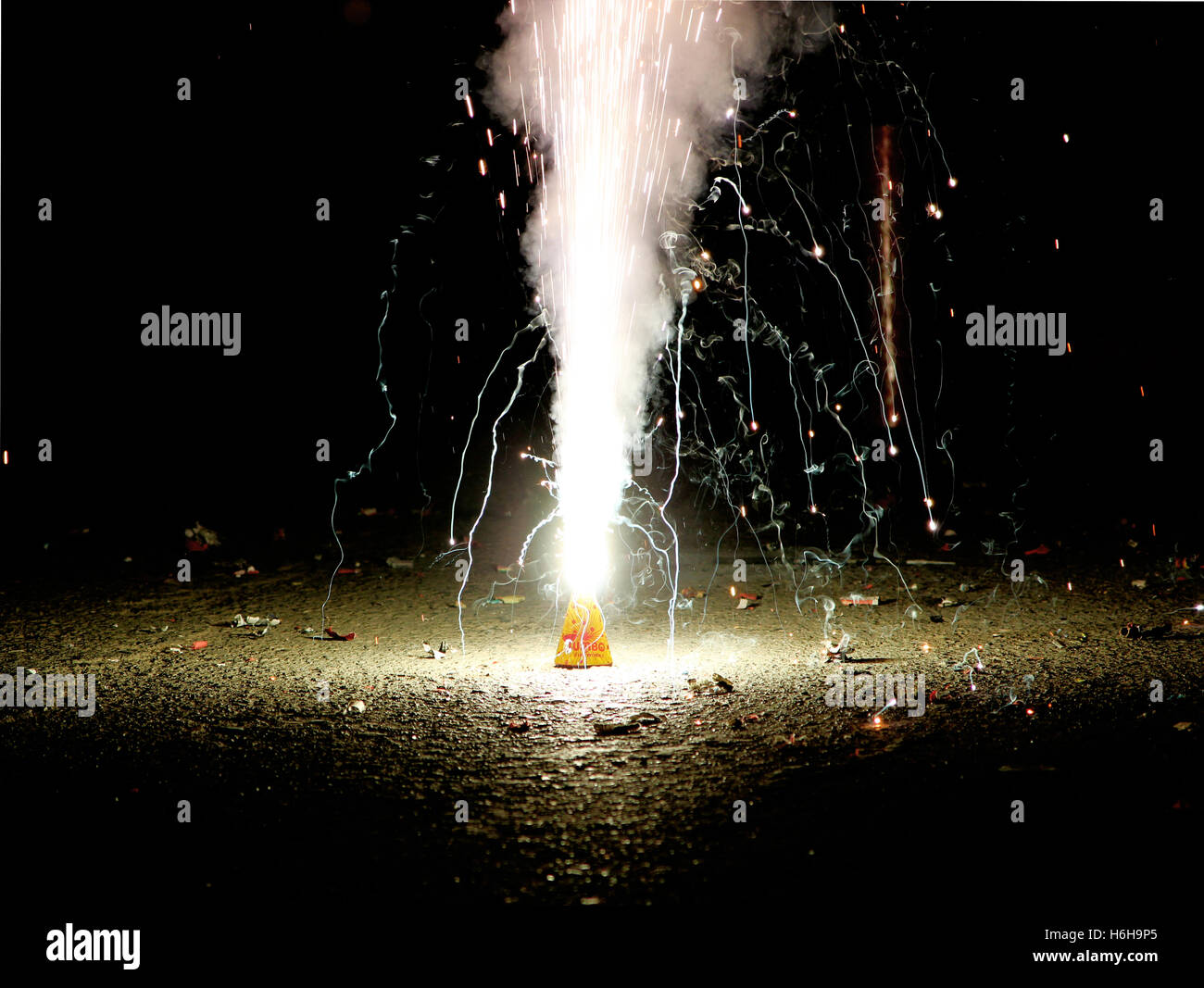 Indian people light firecrackers hi-res stock photography and images ...