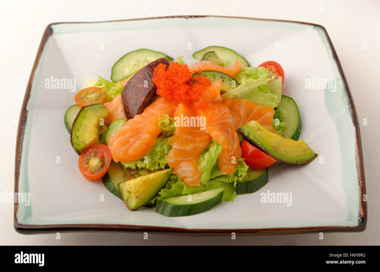 Raw salmon salad with fish roe, an entree from a Japanese restaurant ...