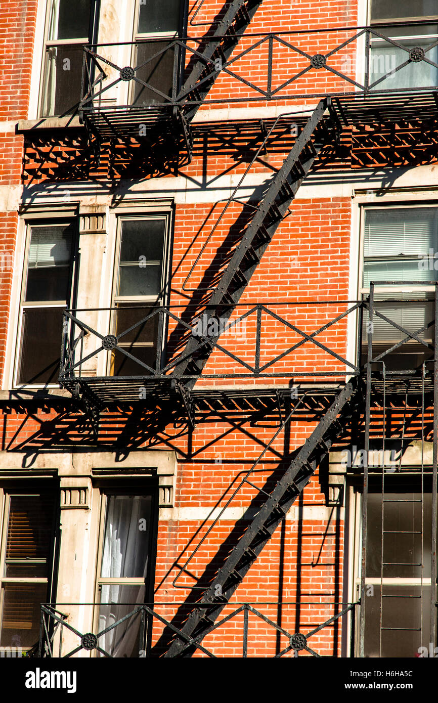 The exterior of a red stone residential building in Manhattan Stock ...