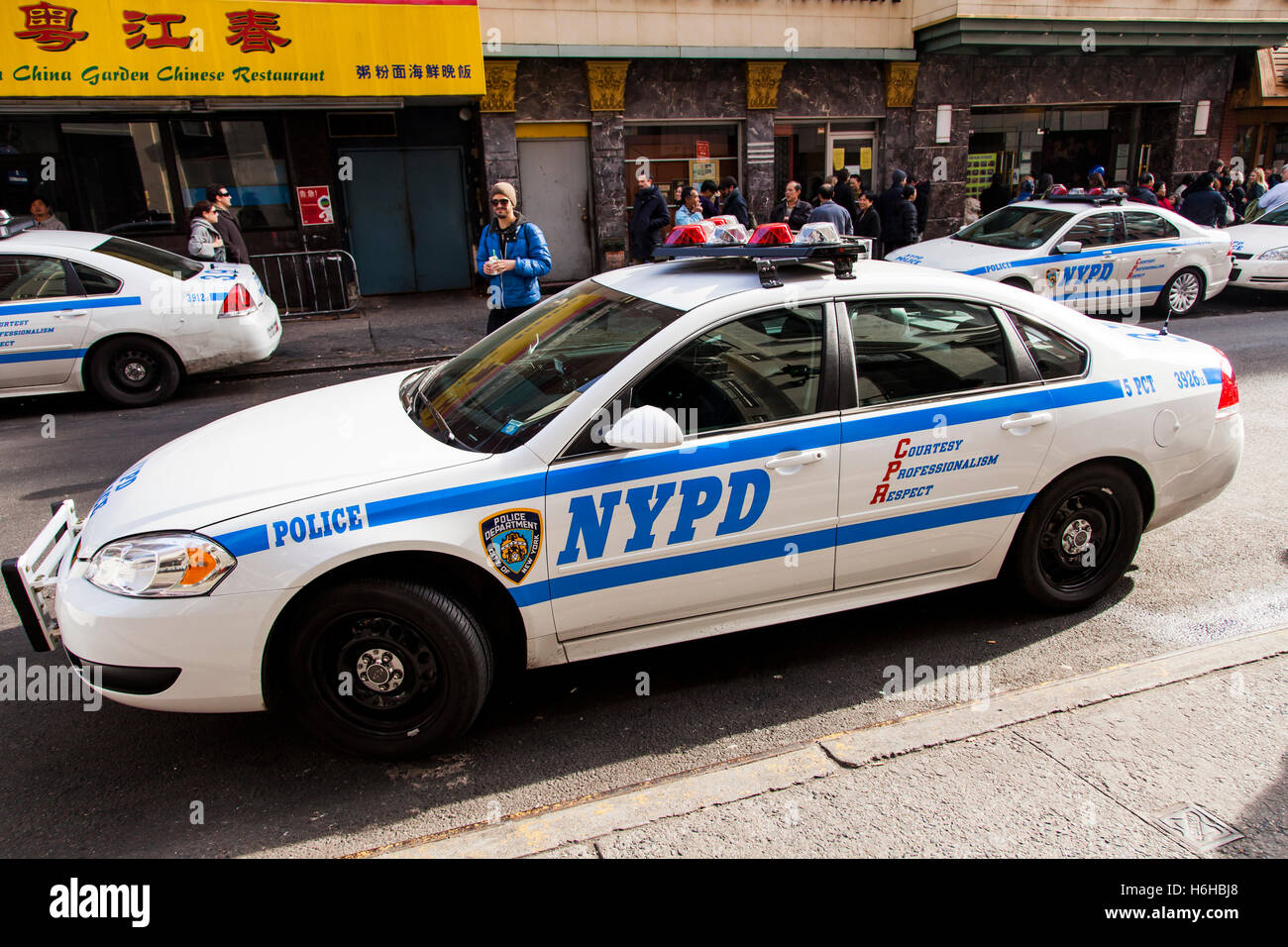 New-York, USA - NOV 18: Parked police car in a busy Chinatown street on ...