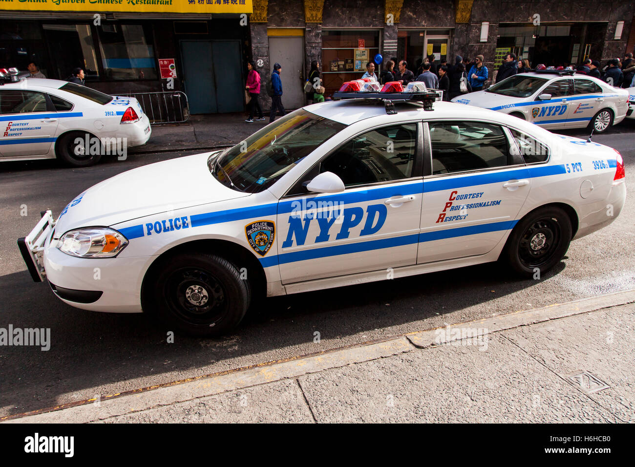 New-York, USA - NOV 18: Parked police car in a busy Chinatown street on ...