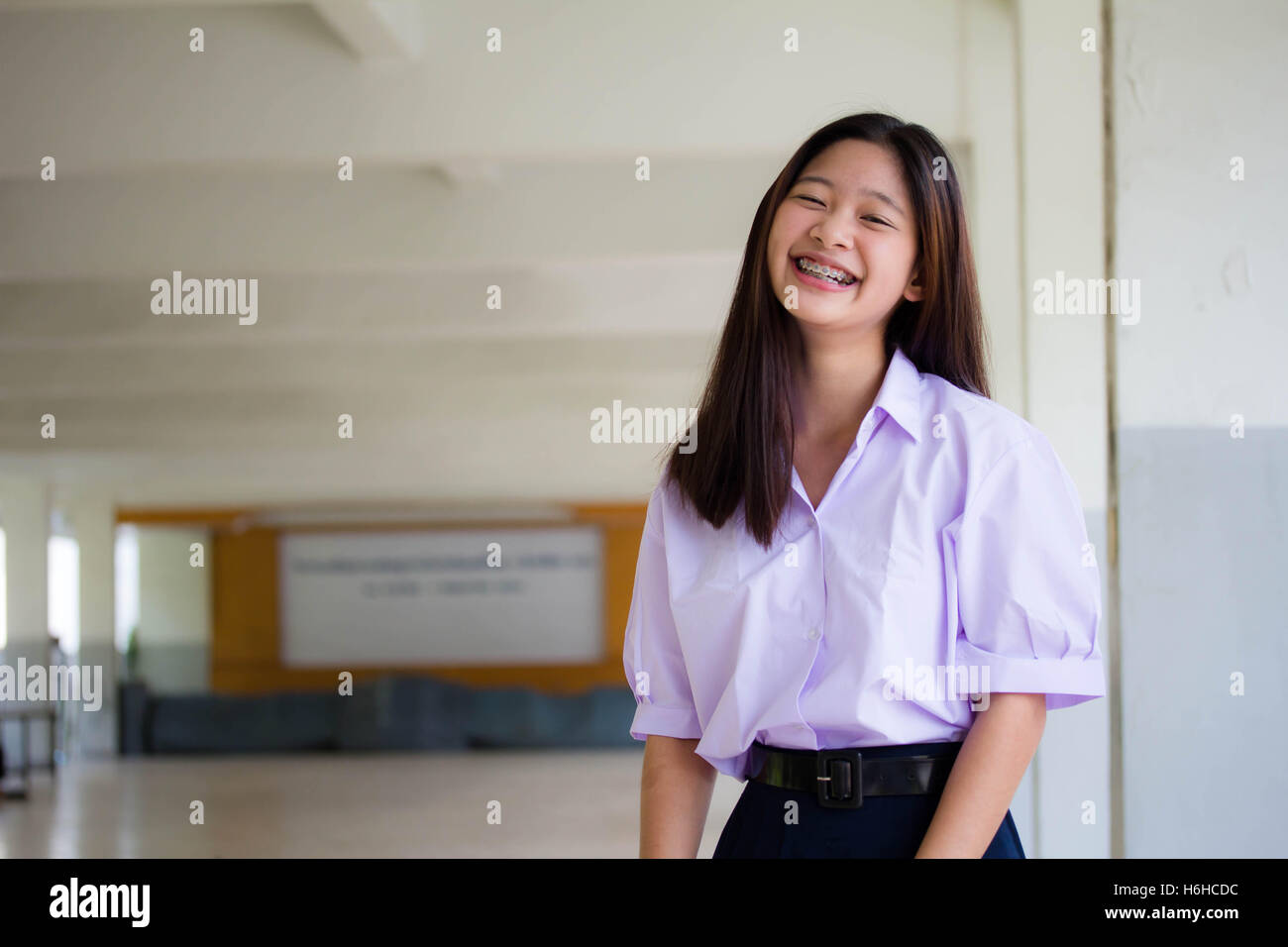 Portrait of thai high school student uniform teen beautiful girl happy and relax Stock Photo - Alamy