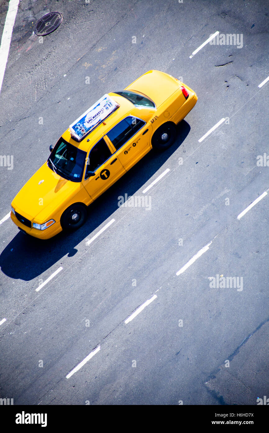 NEW YORK - NOV 11: High angle view of a taxi riding in a Manhattan, New ...