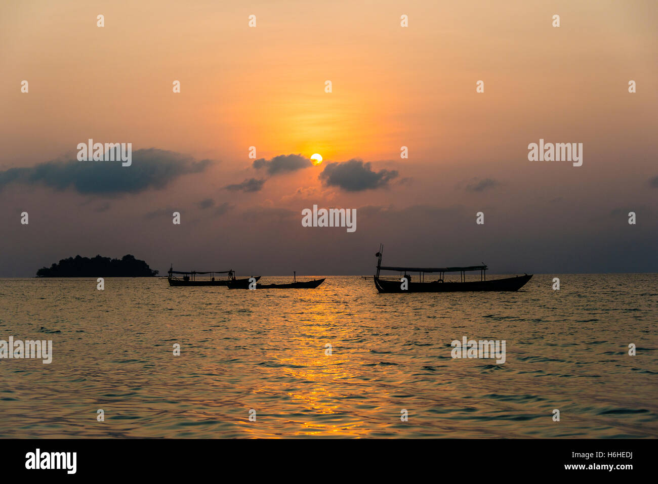 Boats on sea at sunrise from Koh Tui Beach, Koh Touch village, Koh Rong ...