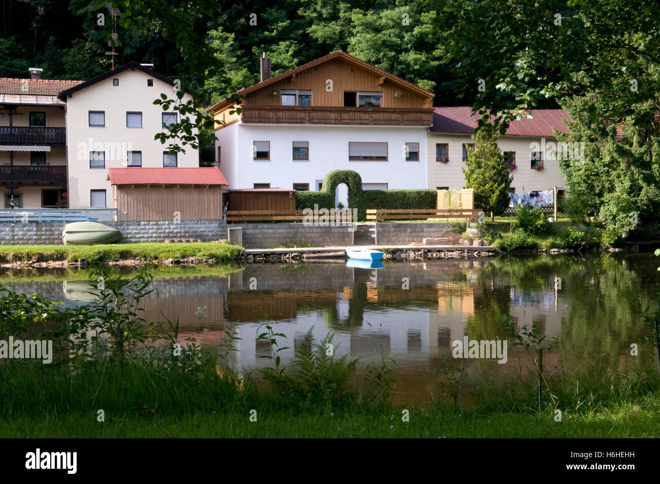 Houses along Regen river, Regen health resort, Bavarian Forest, Bavaria ...