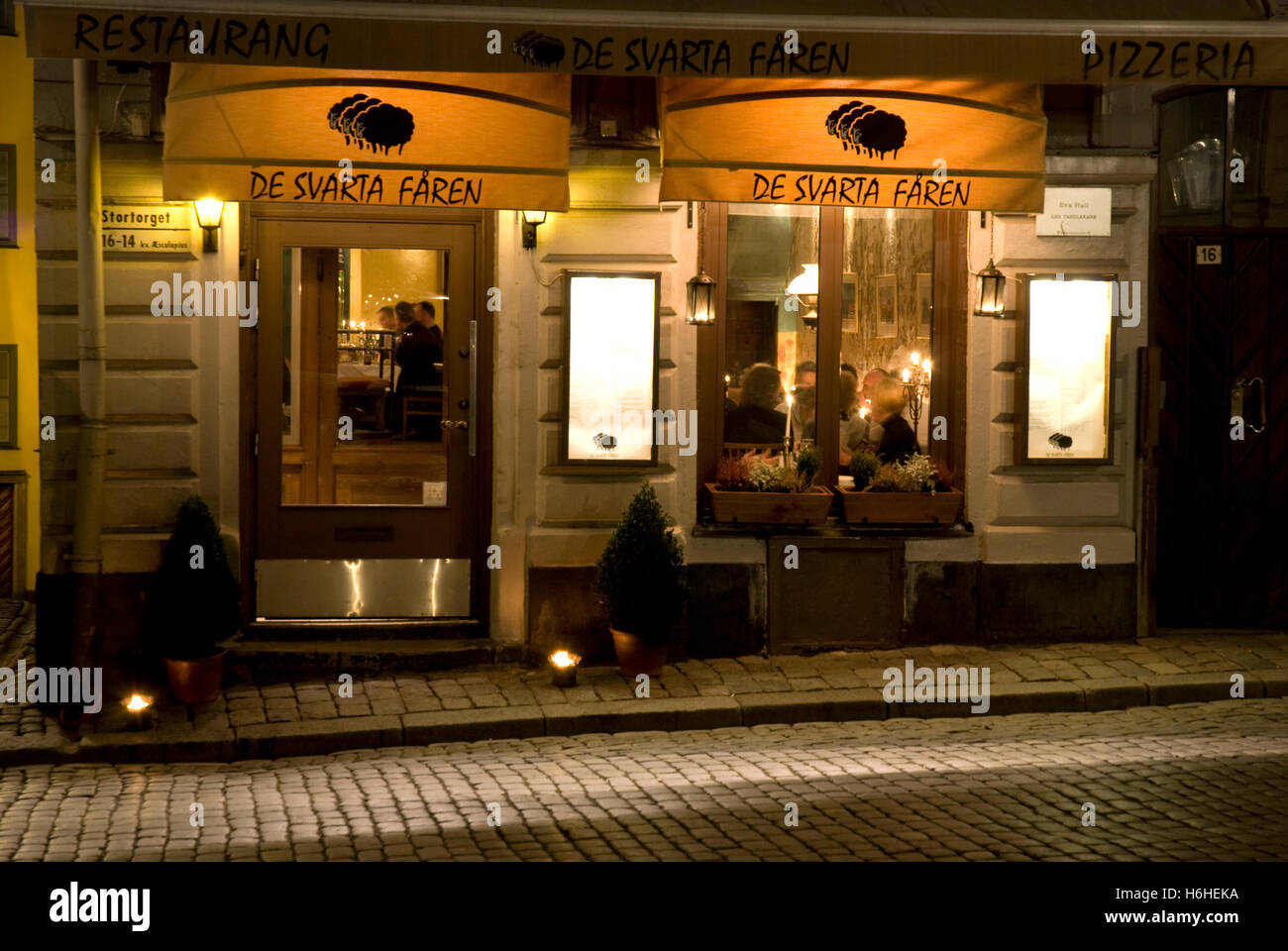 Bar in the historic centre of Gamla Stan at night, Stockholm, Sweden ...
