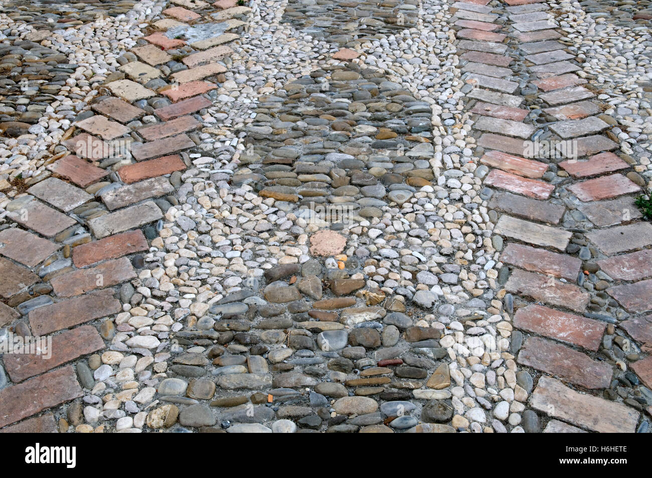 Pebble pavement in the historic centre, San Remo, Riviera, Liguria ...