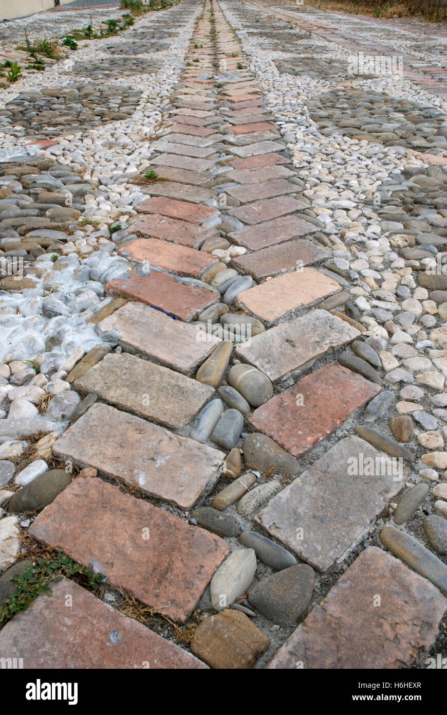 Cobble-stone pavement in the historic centre, San Remo, Riviera ...