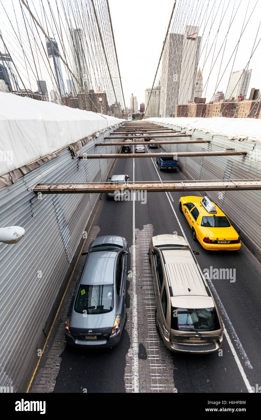 NEW-YORK - NOV 15: Afternoon rush hour traffic on the Brooklyn Bridge ...