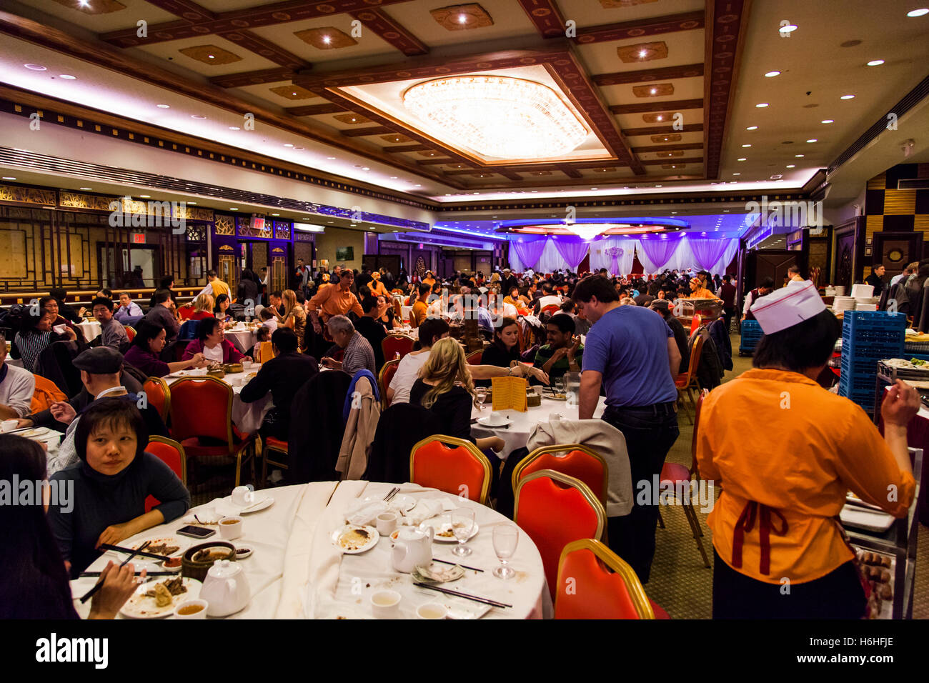 New-York, USA - NOV 18: Busy large Chinese restaurant hall in Chinatown ...
