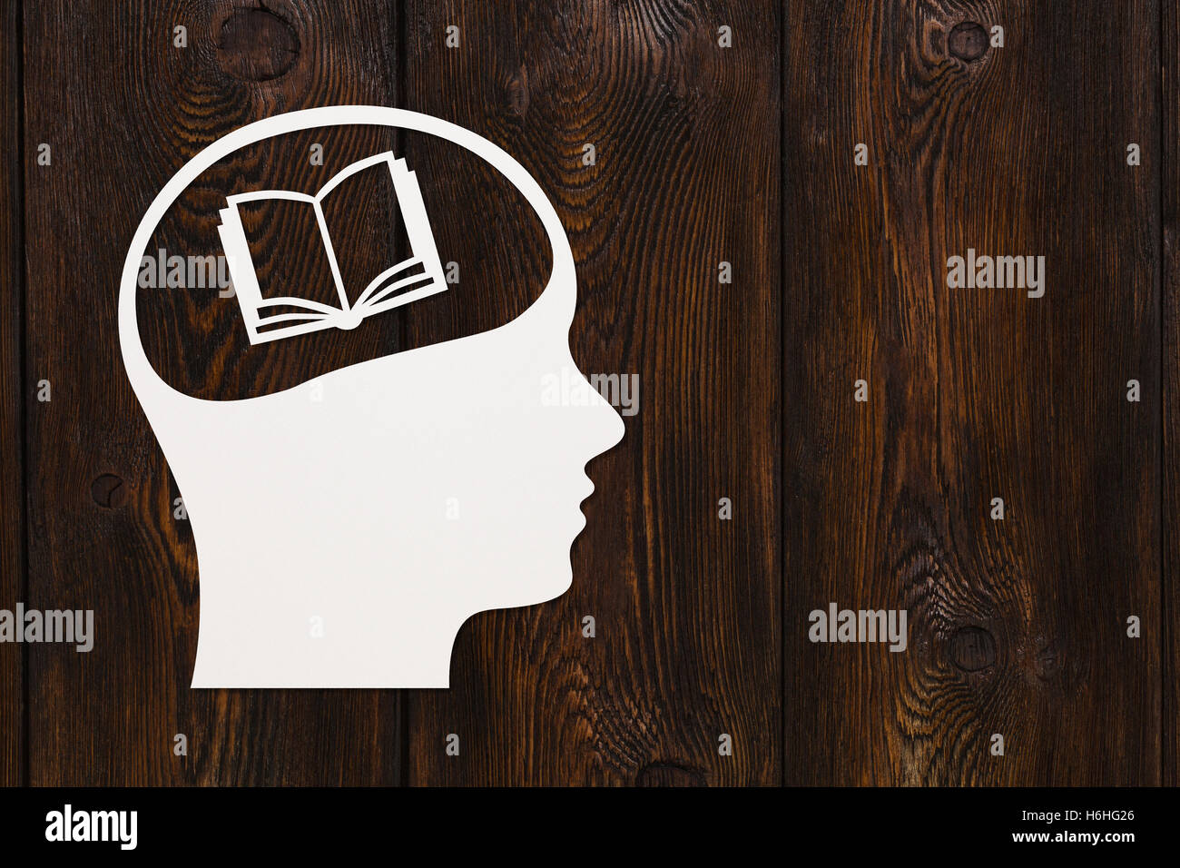 Book inside head hi-res stock photography and images - Alamy