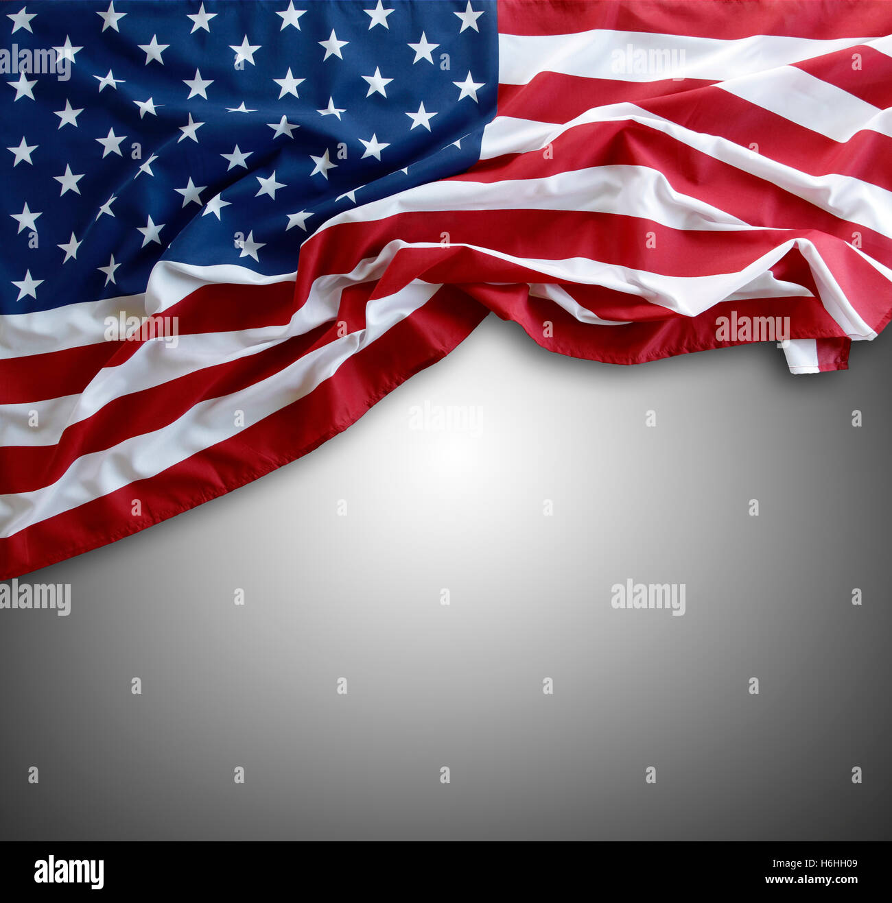 Closeup of American flag on gray background Stock Photo - Alamy