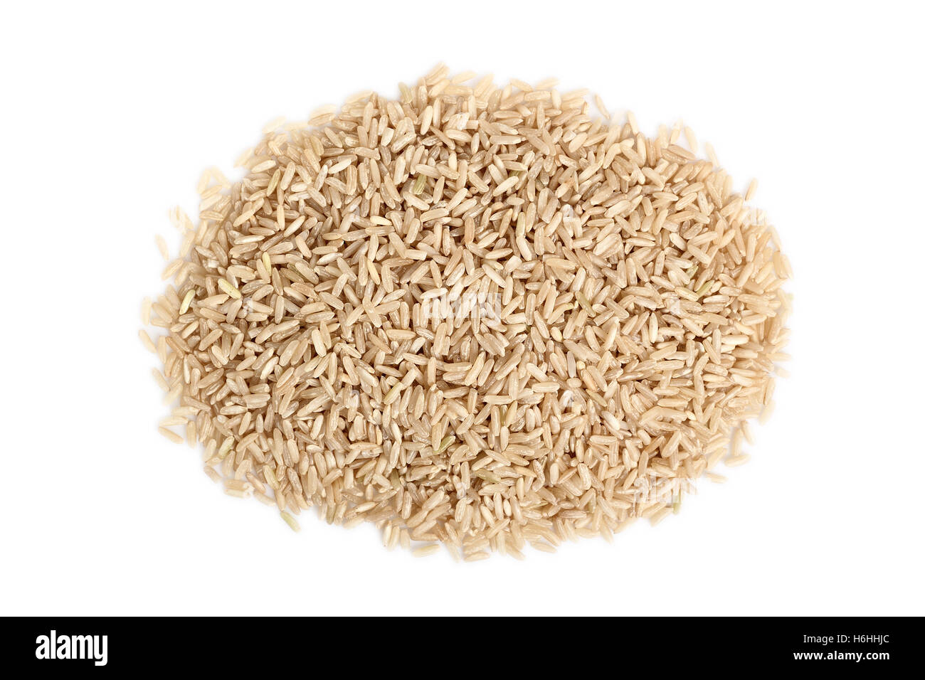 Pile of long grain brown rice. Isolated on white background. Directly ...