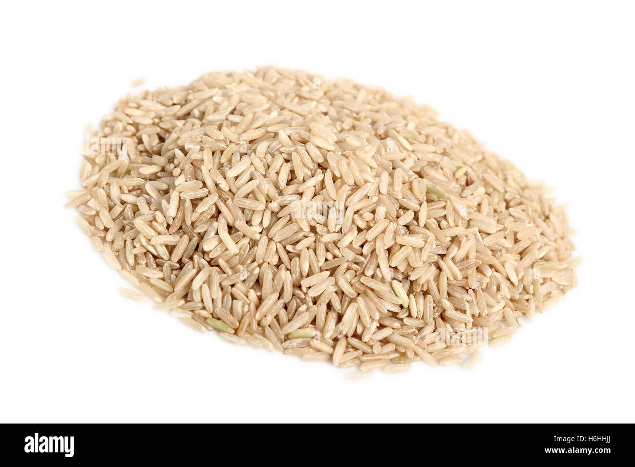 Pile of long grain brown rice. Isolated on white background Stock Photo ...