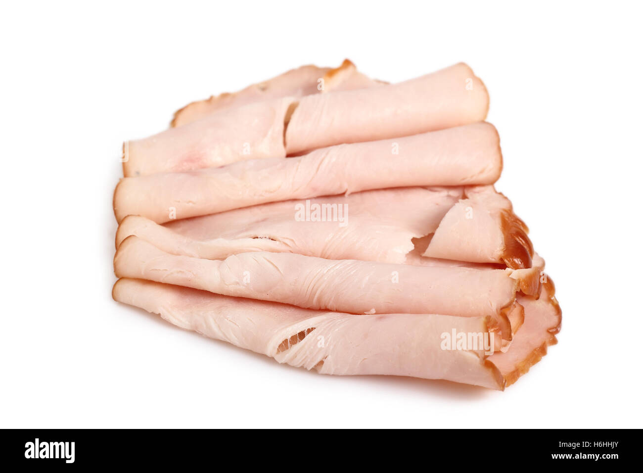 Ham slices. Isolated on a white background Stock Photo - Alamy