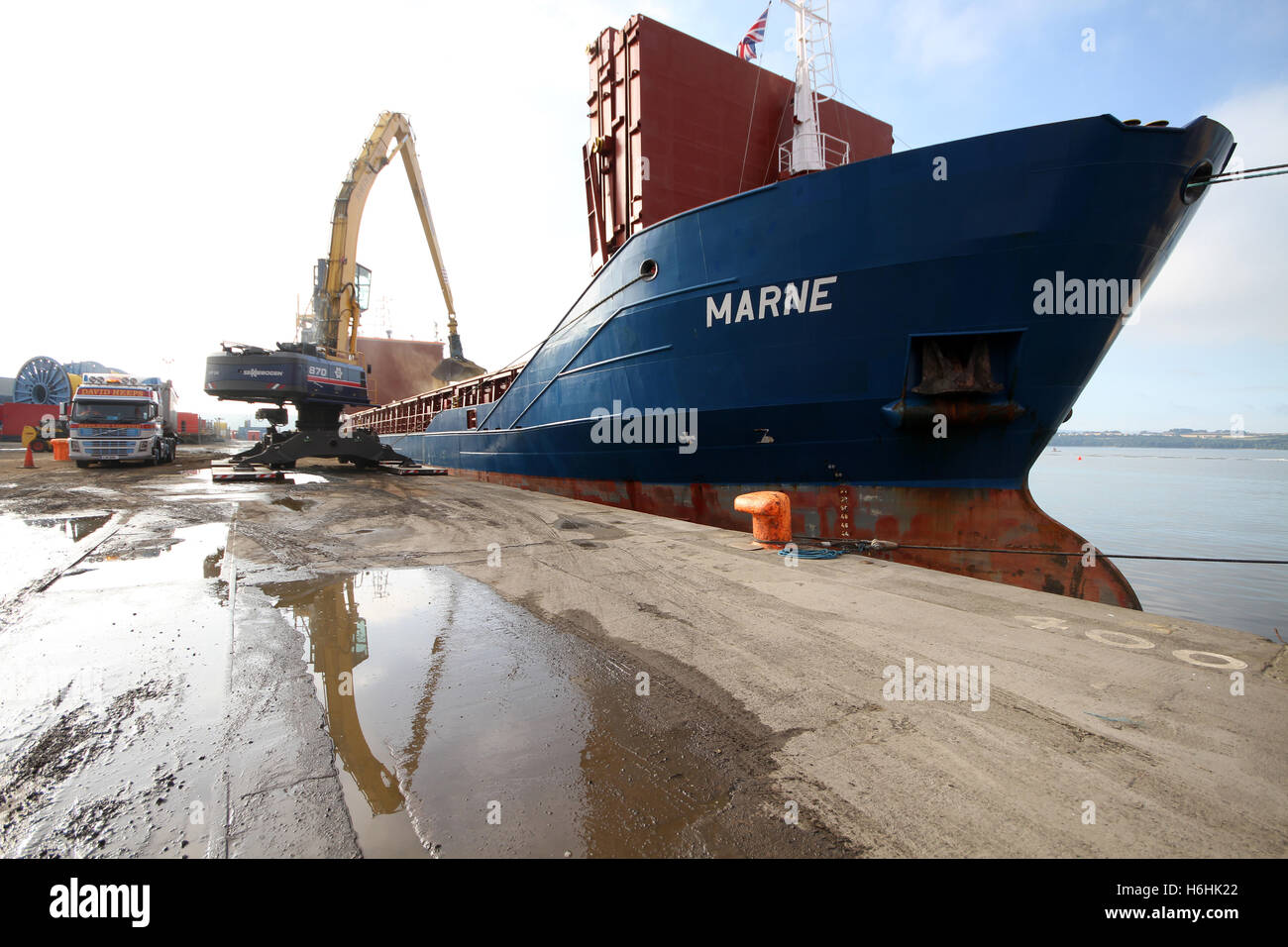 cargo ships unloading at docks Stock Photo - Alamy