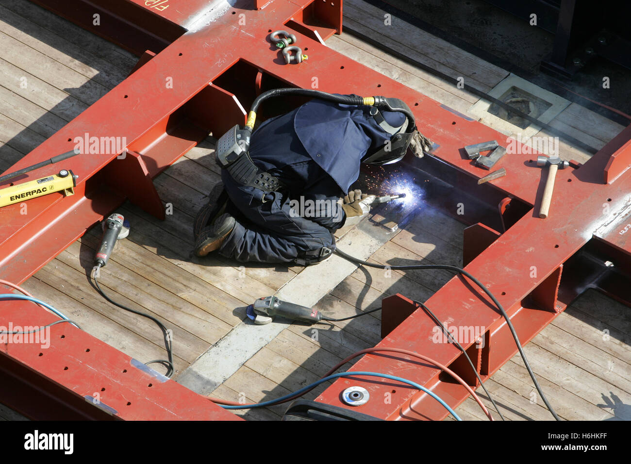Blue collar workers in manufacturing Stock Photo - Alamy