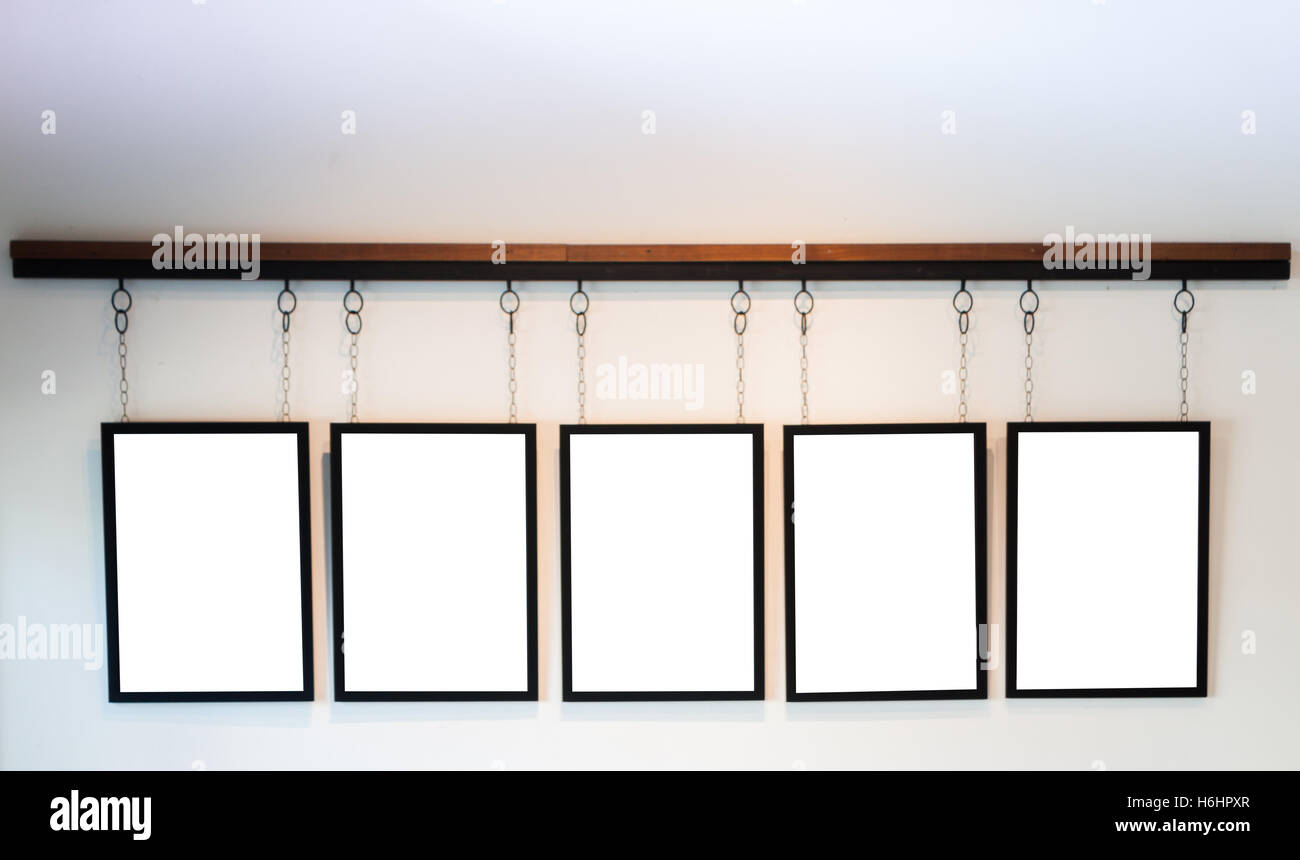 Blank boards hanging on white wall background, stock photo Stock Photo ...