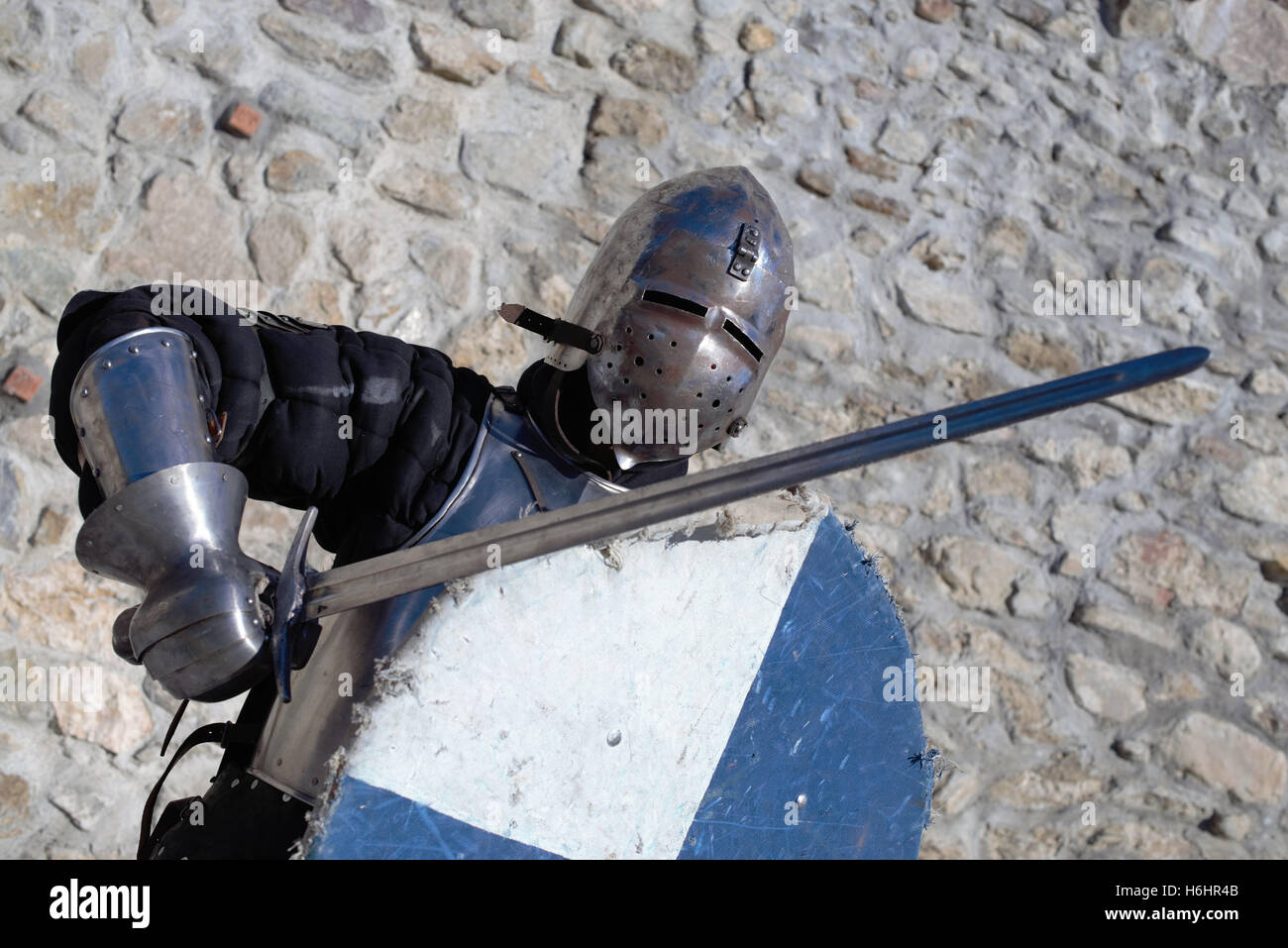 medieval metal armor and helmet mercenary knight swordsman Stock Photo ...