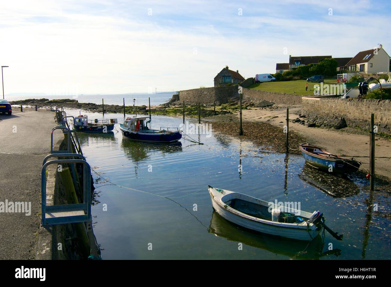 Fishing boats moored at Lower Largo harbour Fife Scotland Stock Photo ...