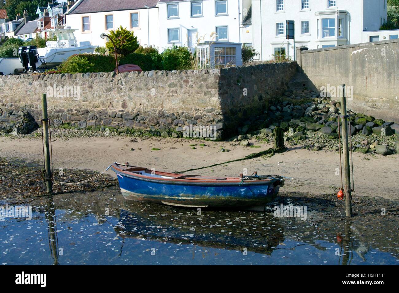 Rowing boat moored at the harbour at Lower Largo Fife Scotland Stock ...