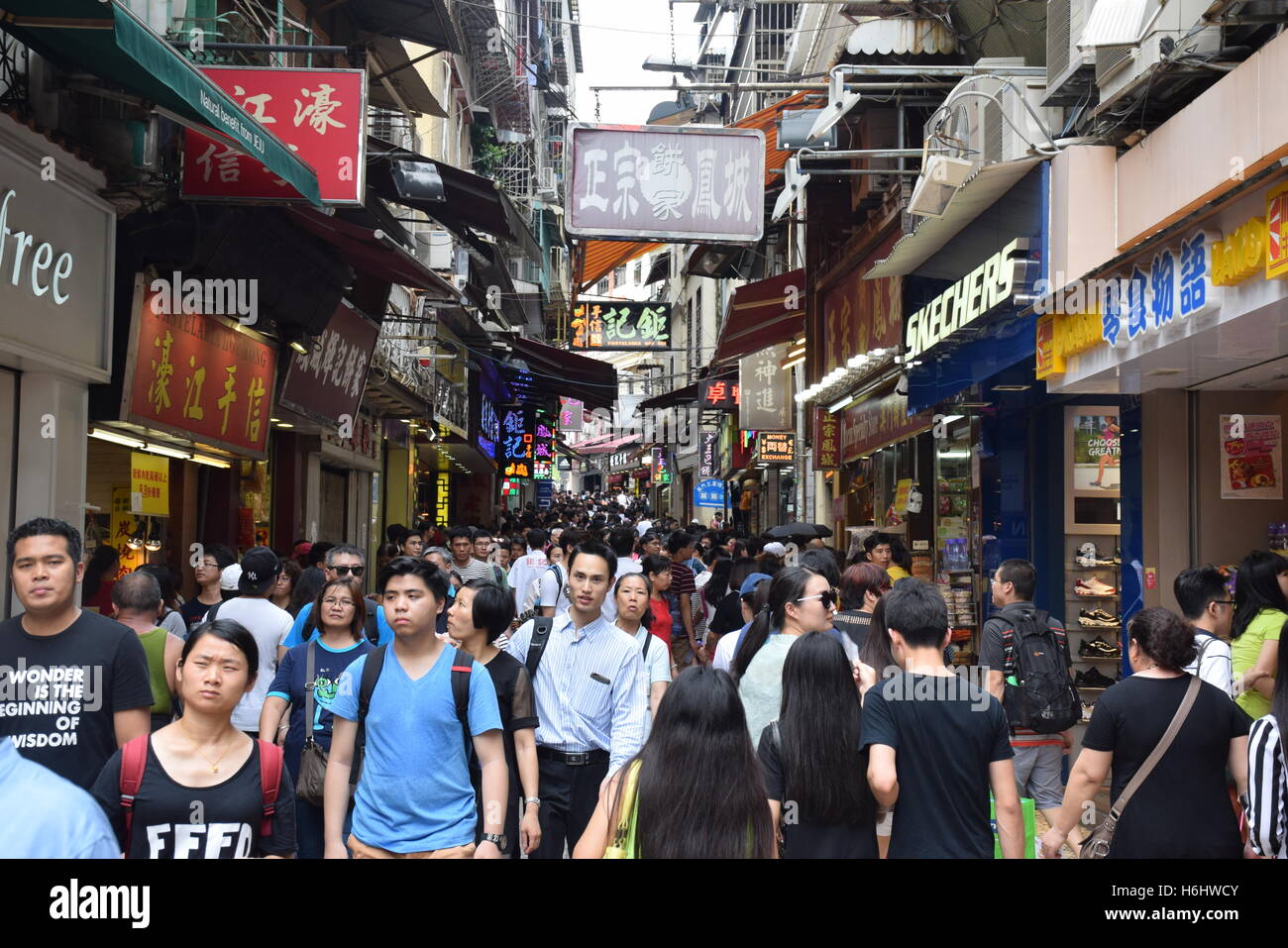 Crowd of asian people and tourists on the busy streets of Macau, China Stock Photo - Alamy