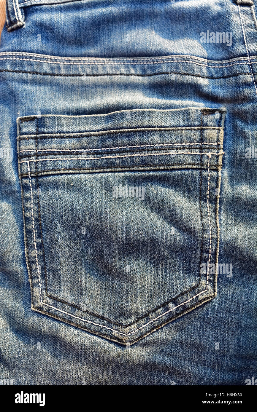 Back pocket in blue jeans trouser Stock Photo - Alamy