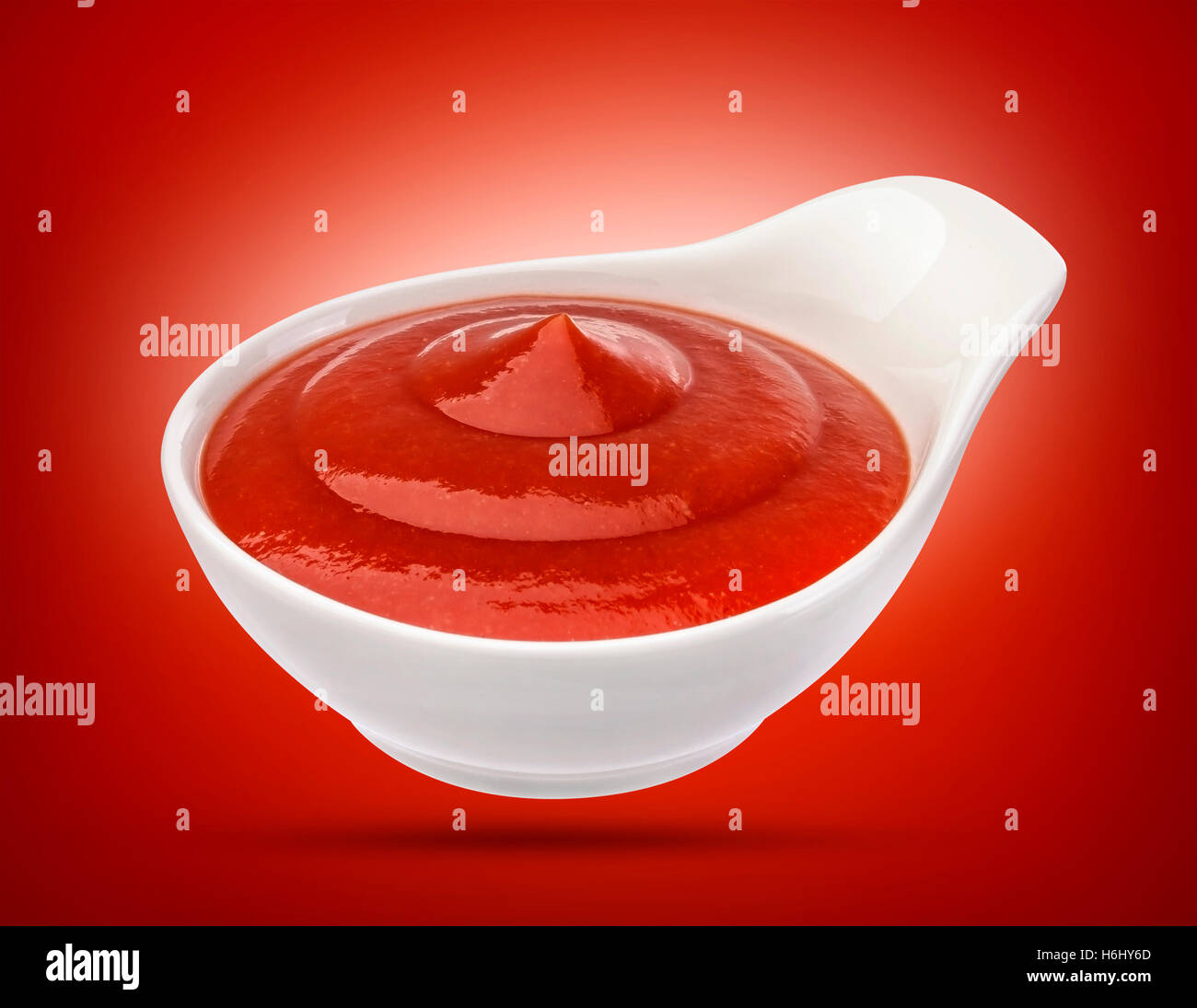 Ketchup in white bowl isolated. Tomato sauce Stock Photo - Alamy
