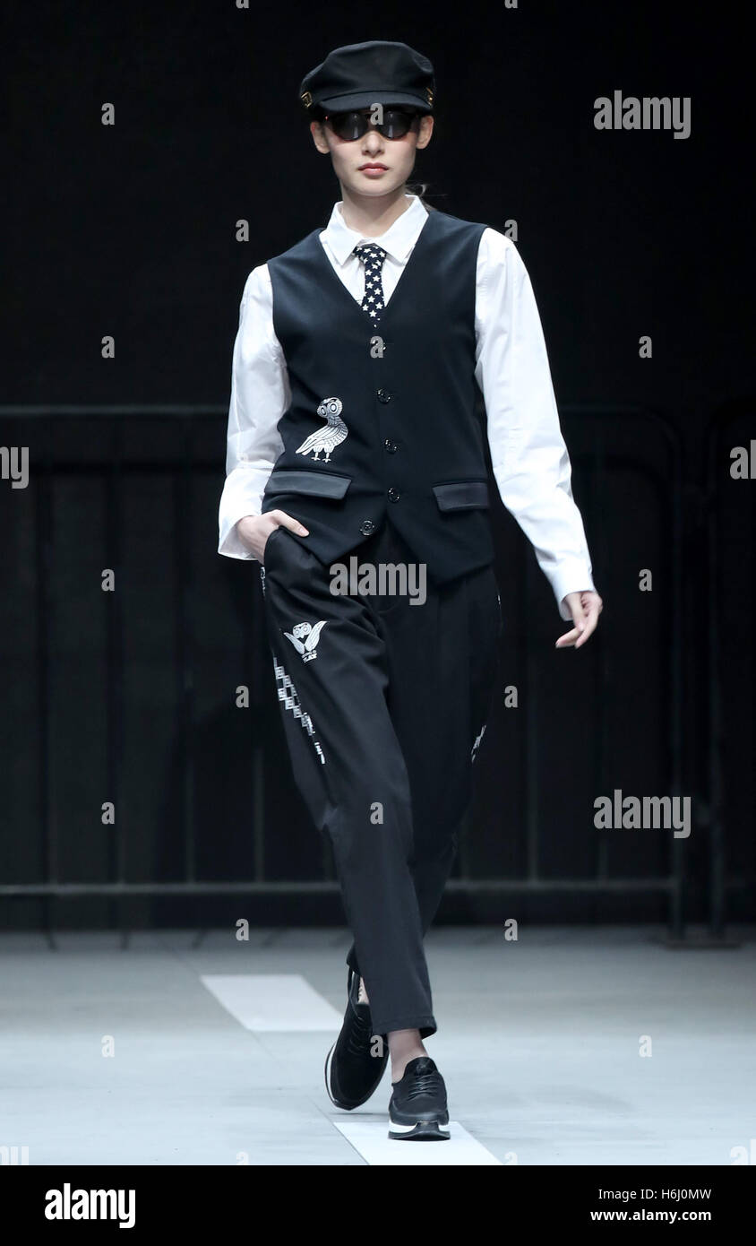 Beijing, China. 28th Oct, 2016. A model presents a creation by designer ...
