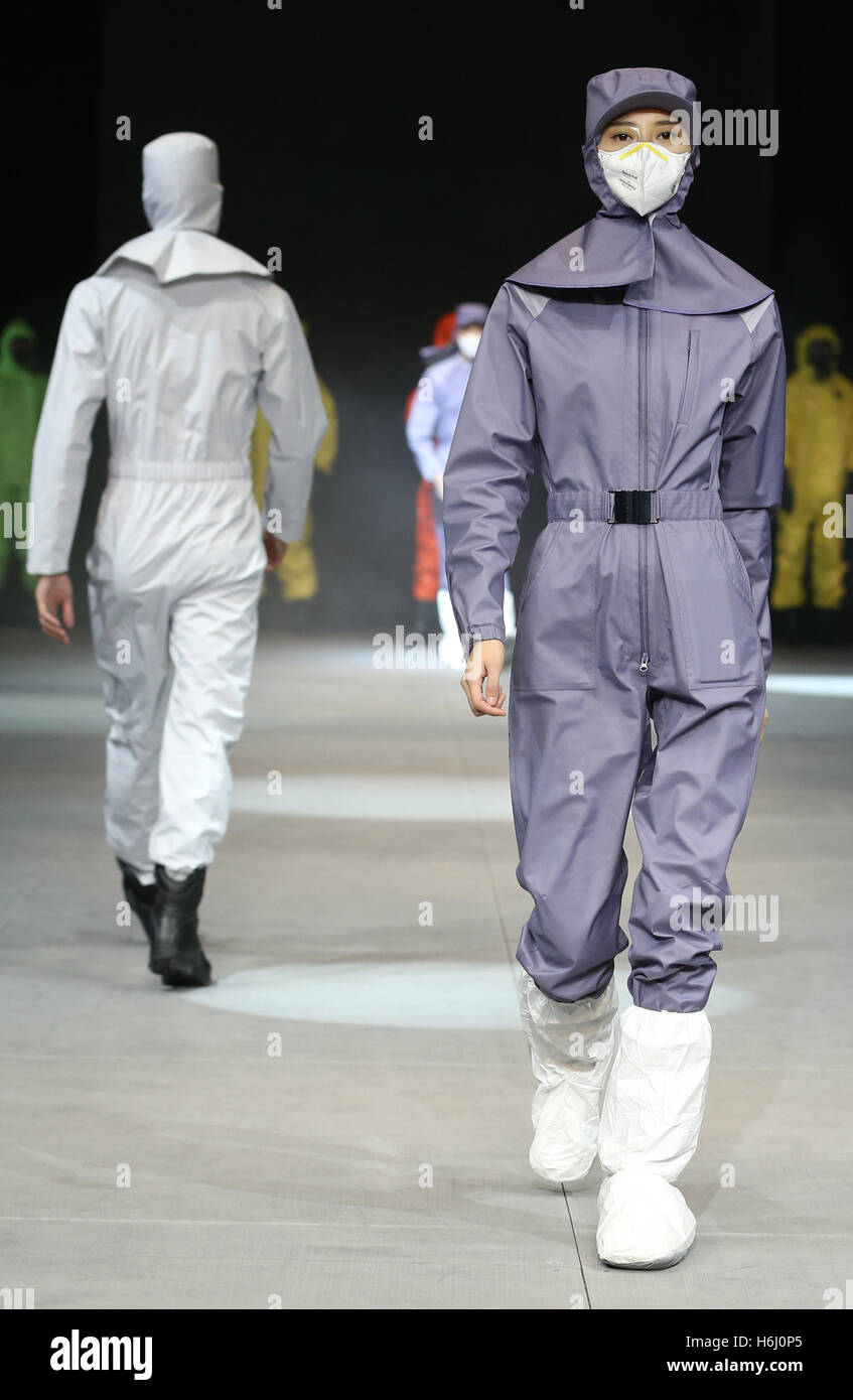 Beijing, China. 28th Oct, 2016. A model presents a safety protection ...